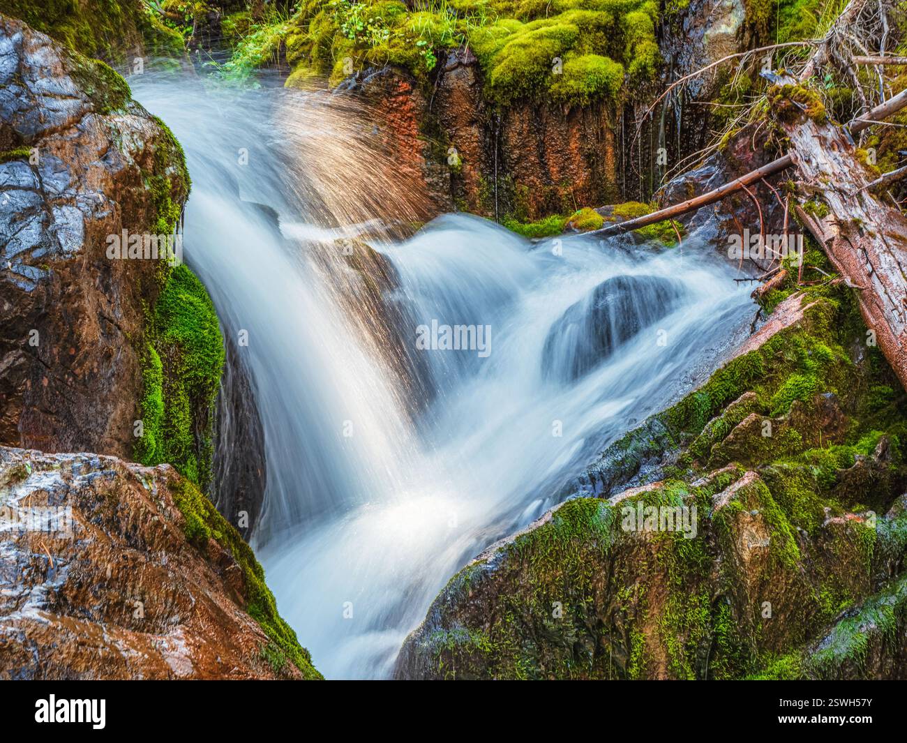Atmospheric minimal landscape with a long exposure of a large waterfall ...