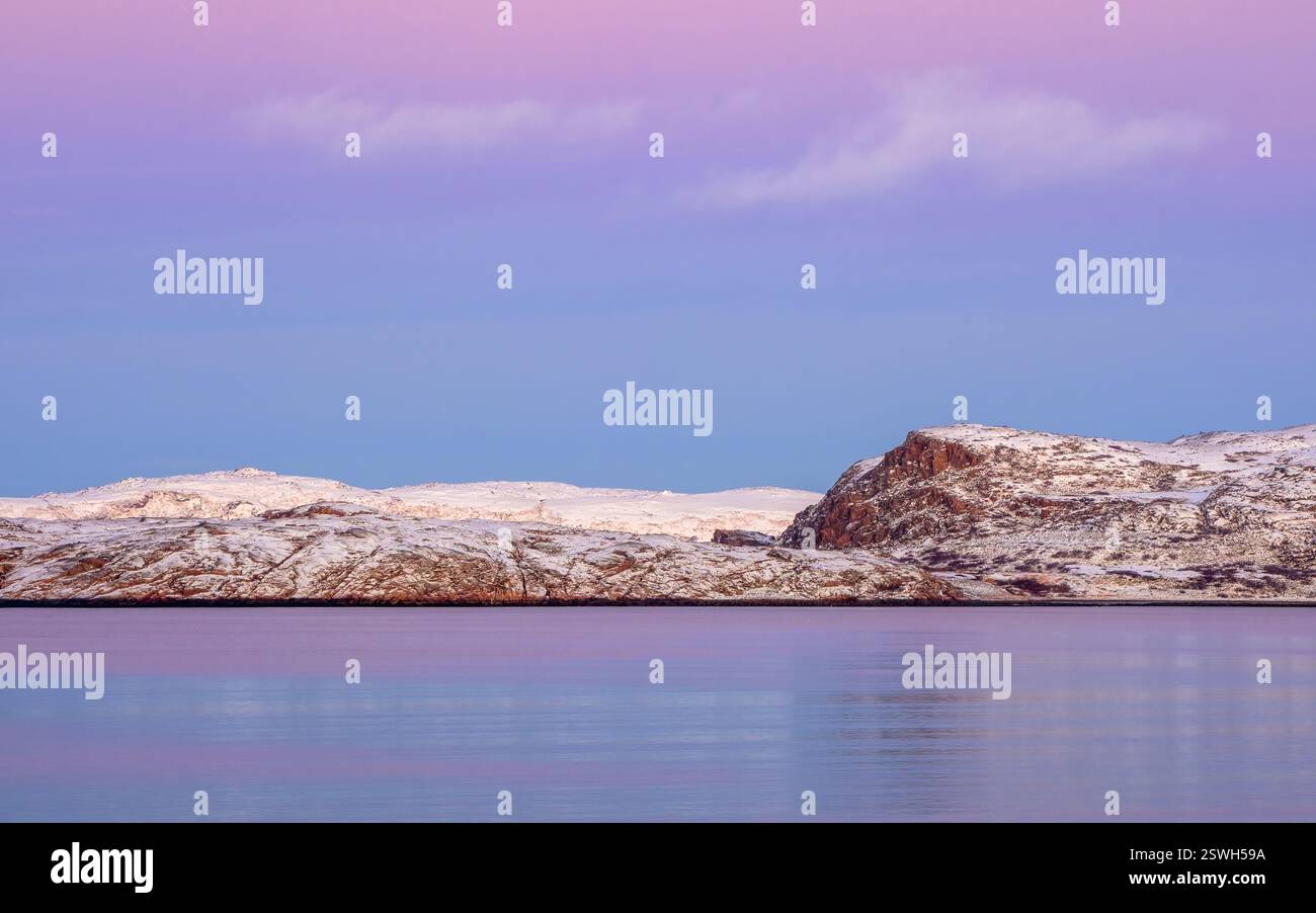 Amazing sunset polar landscape with white snowy mountain range on the ...