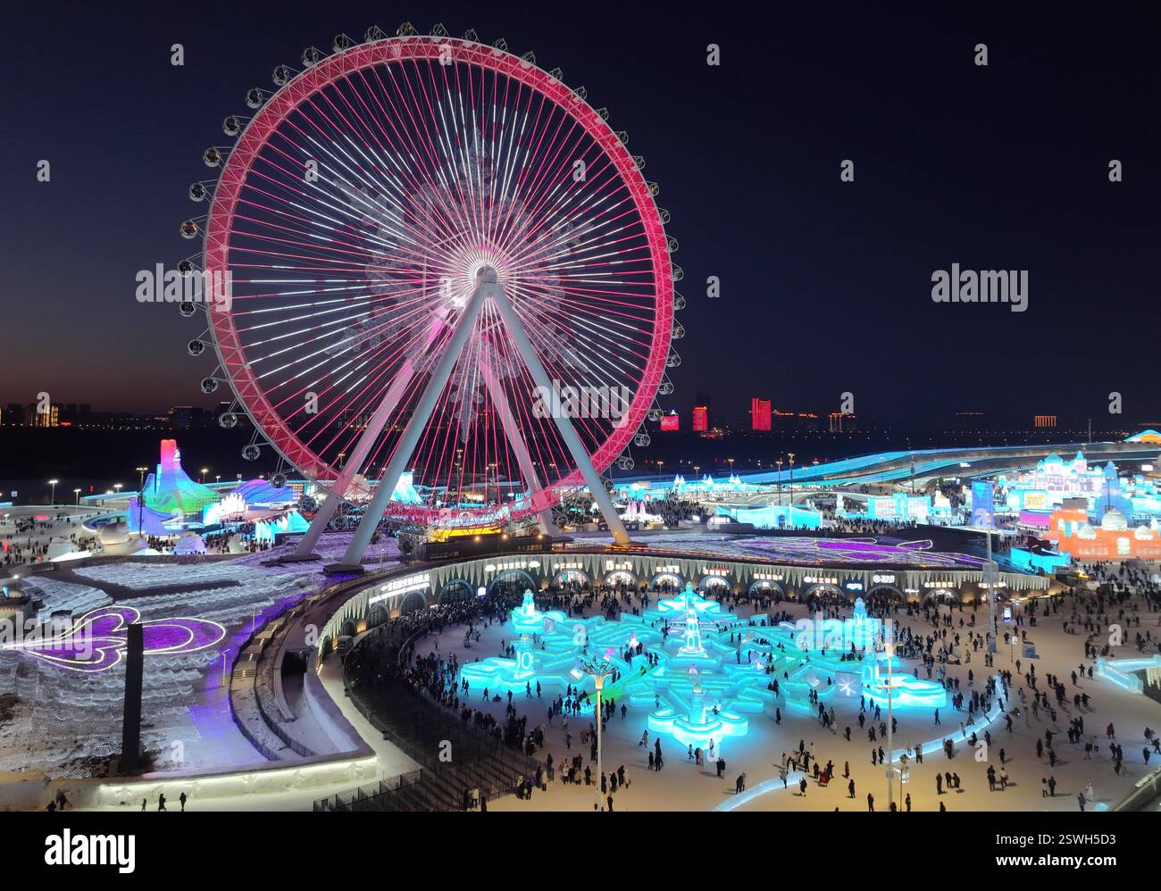 Aerial photo shows tourists playing at Harbin Ice and Snow World in ...