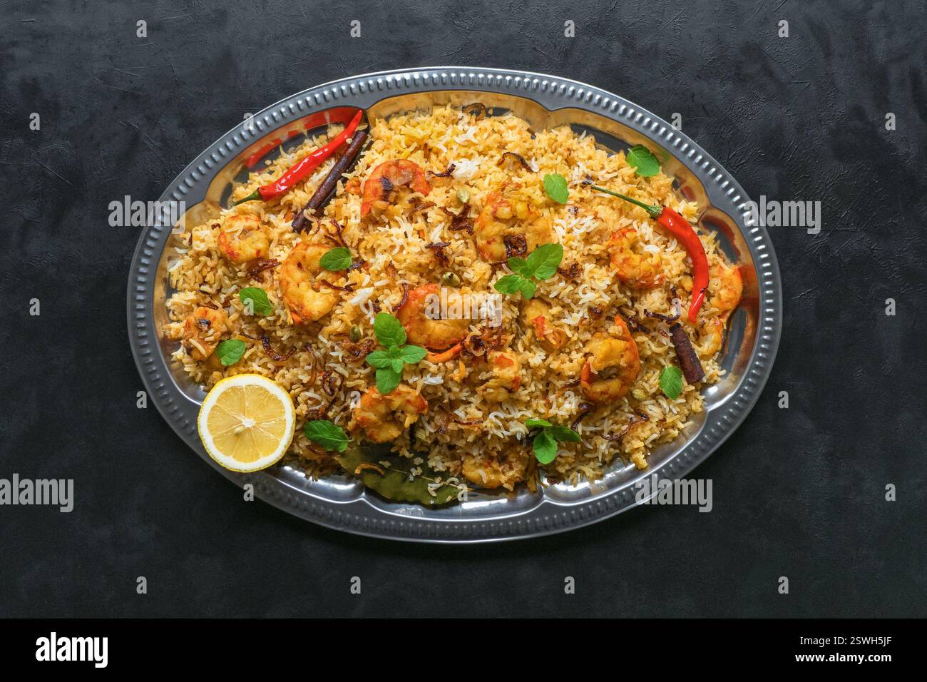 Biryani with shrimp. Tasty and delicious prawns biryani, top view Stock ...