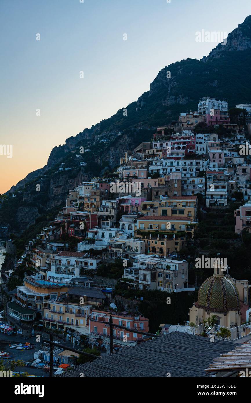 The cityscape and sunset sky of Positano on the Amalfi Coast, Italy ...