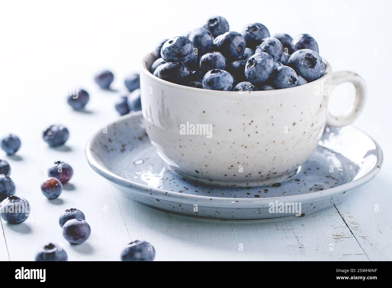 Cup of blueberries Stock Photo - Alamy