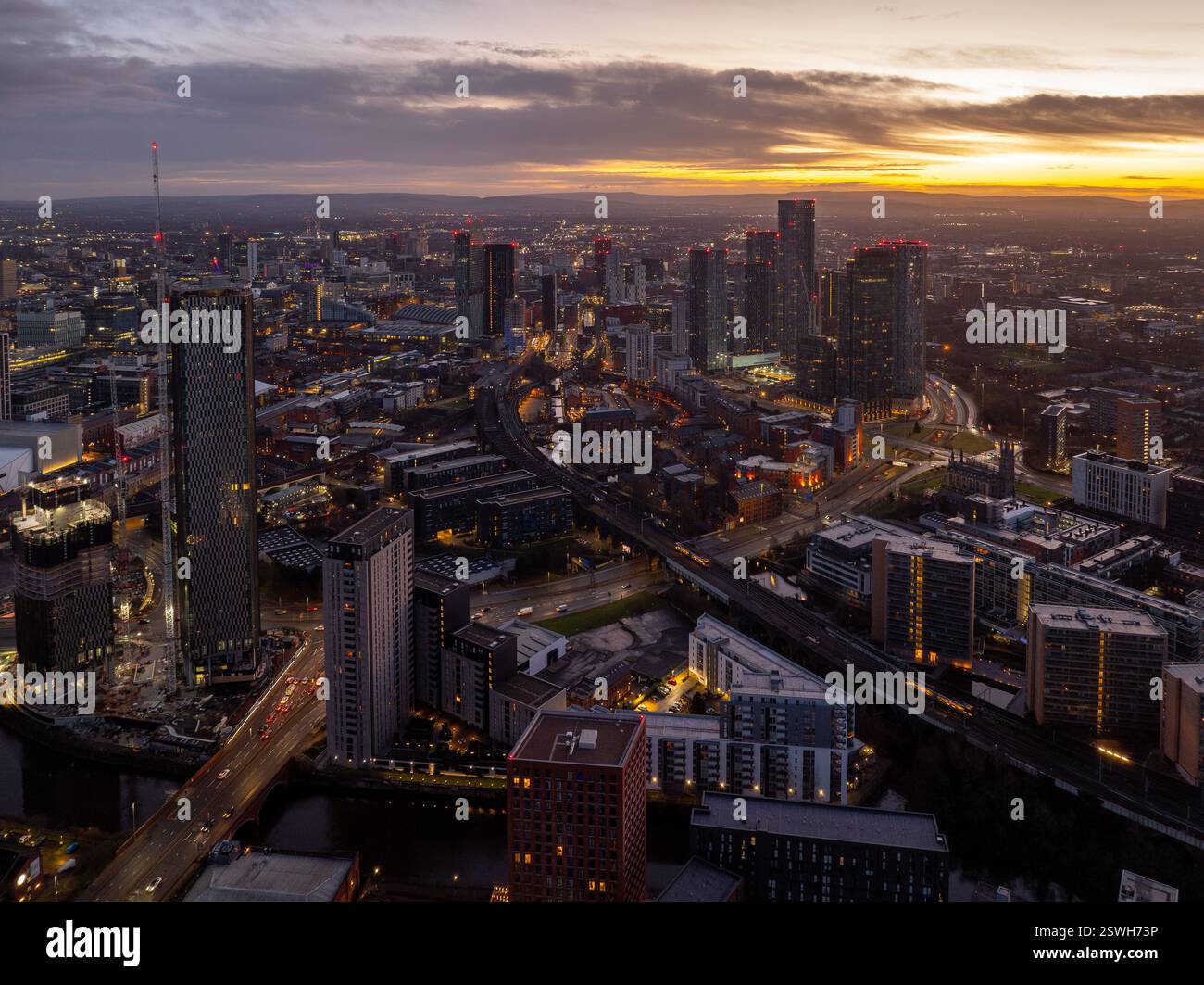 Sunset Over Manchester Cityscape and Urban Skyline Stock Photo - Alamy