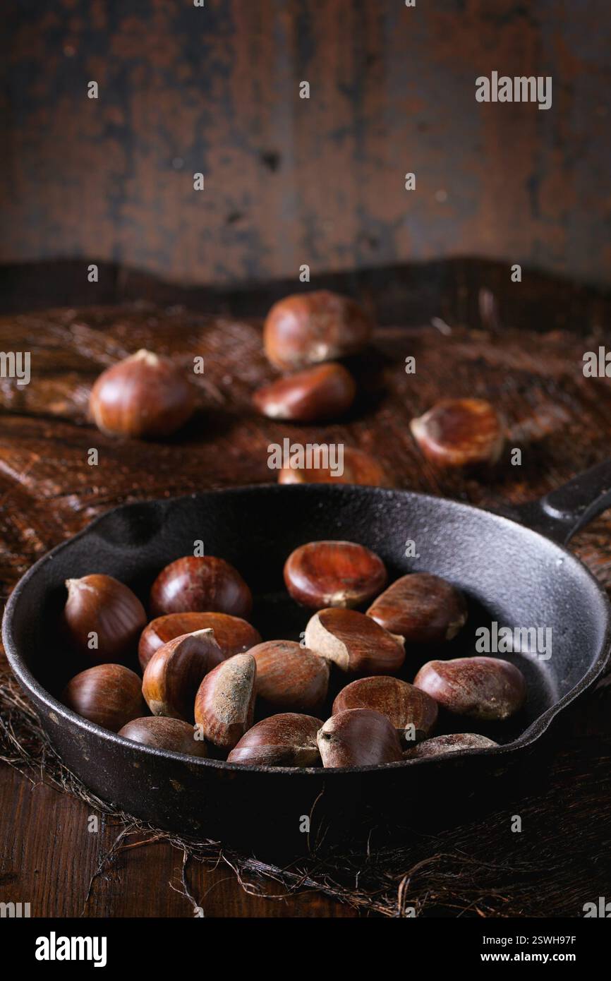 Uncooked edible chestnuts Stock Photo - Alamy