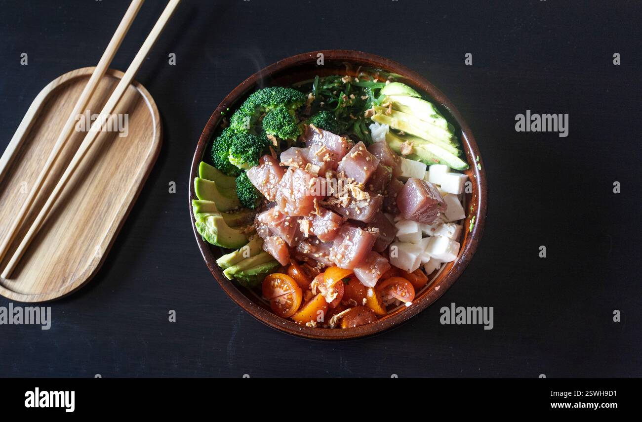 Steaming hot hawaiian tuna poke bowl with healthy ingredients Stock ...