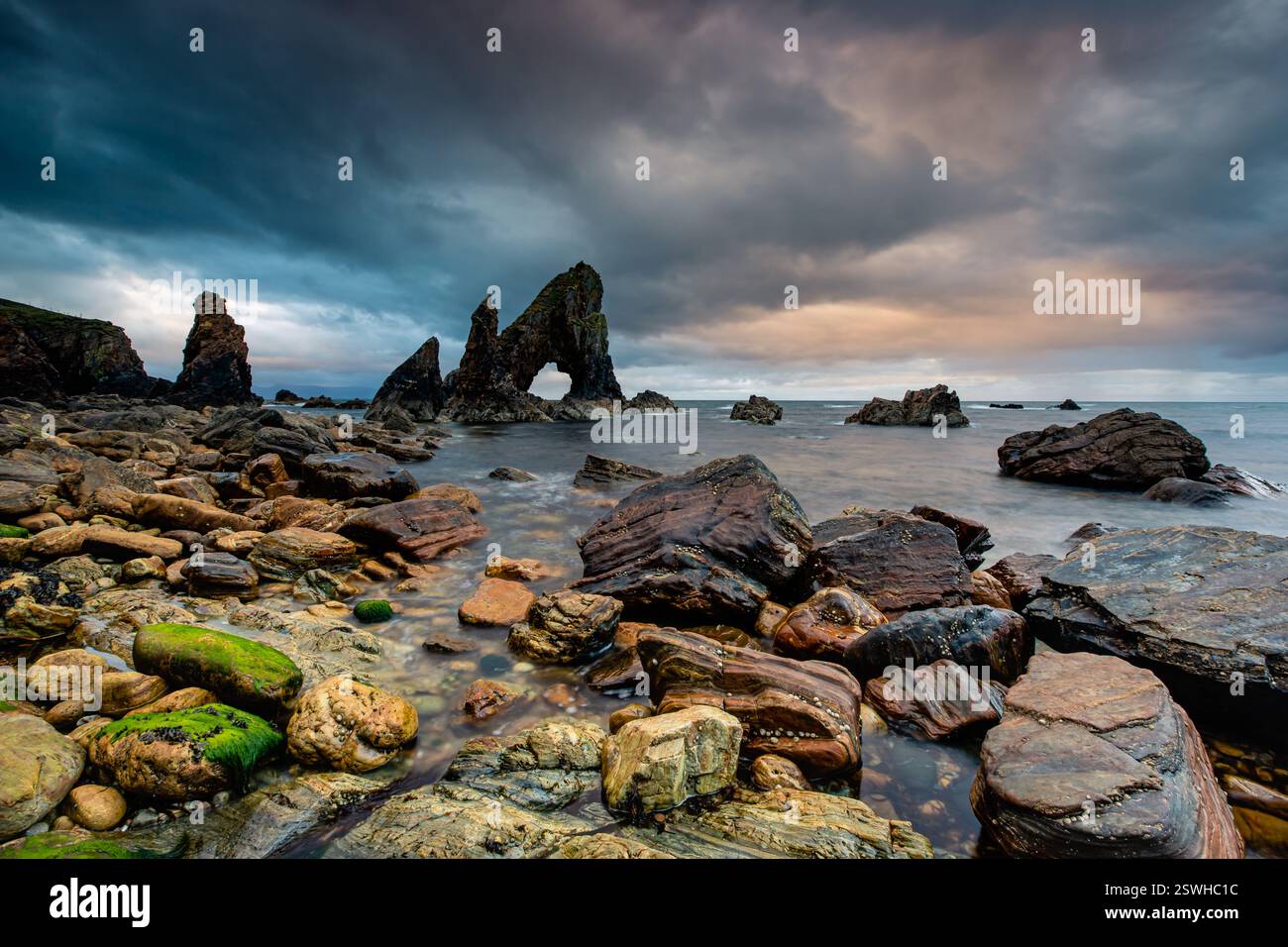Beautiful sunset at Crohy Arch, Crohy Head, County Donegal, Ireland ...