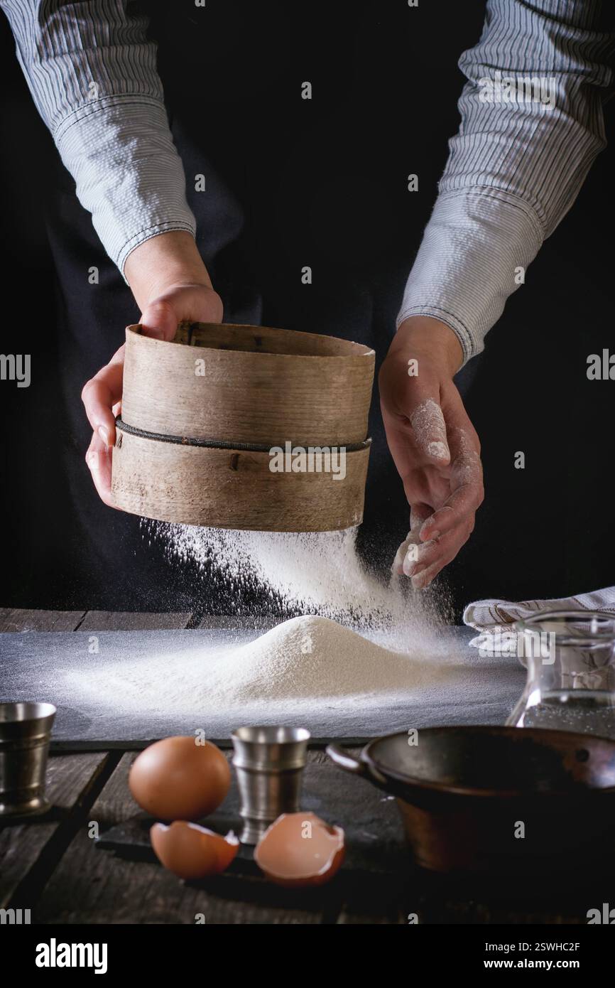 Process sifting flour hands hi-res stock photography and images - Alamy