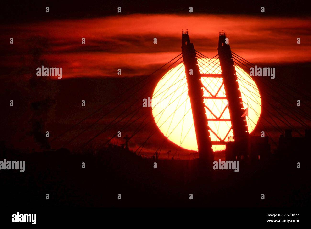Sunset behind the Cable-stayed Bridge across the Korabelny Fairway ...