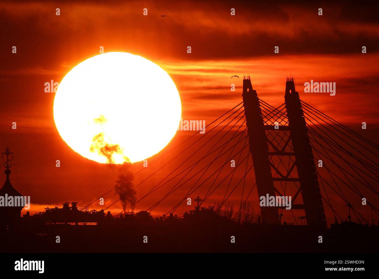 Sunset behind the Cable-stayed Bridge across the Korabelny Fairway ...