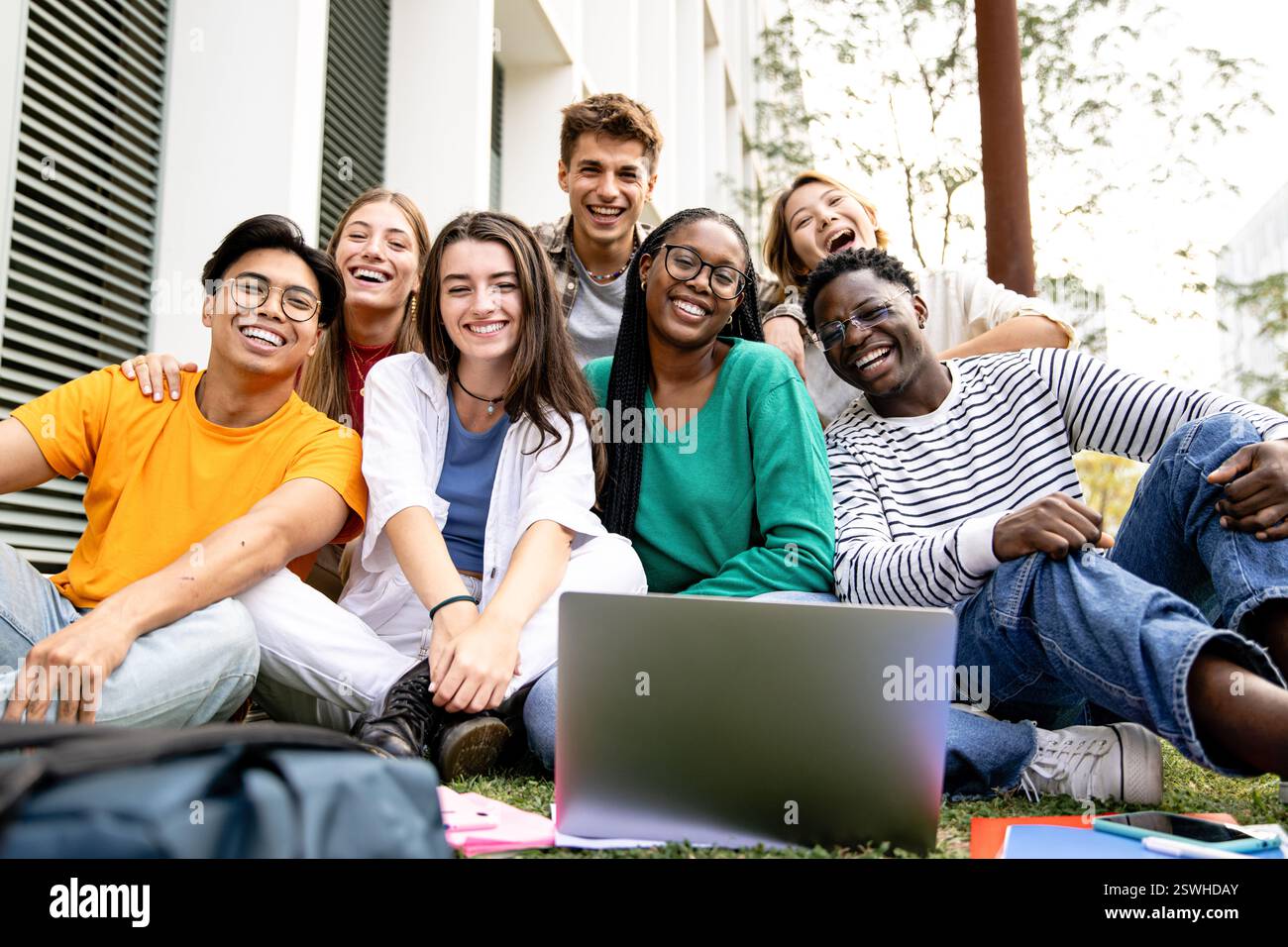 A Diverse Group of Students Happily Enjoying Their Time Together in the ...