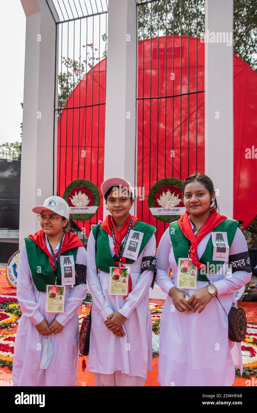 Children pose for pictures as they pay tribute at the Martyr's Monument ...