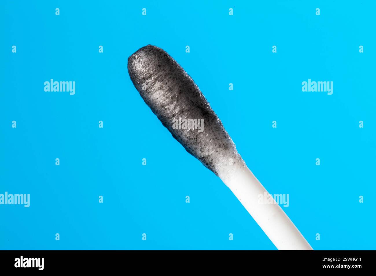 probe for a swab from the nose and nasopharynx on a blue background for ...