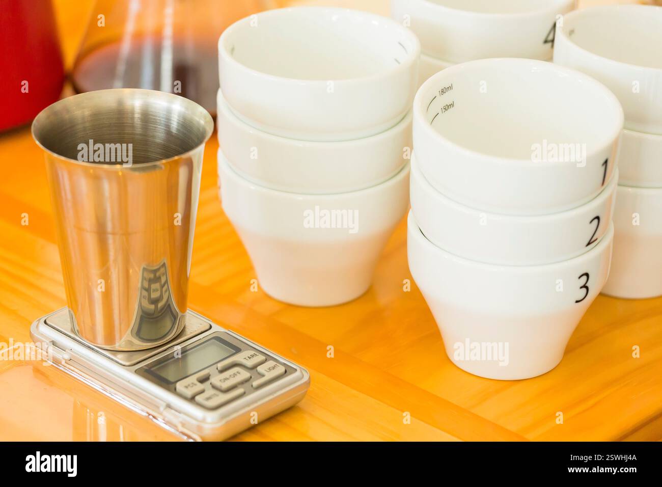 Coffee cupping cup and scale Stock Photo - Alamy