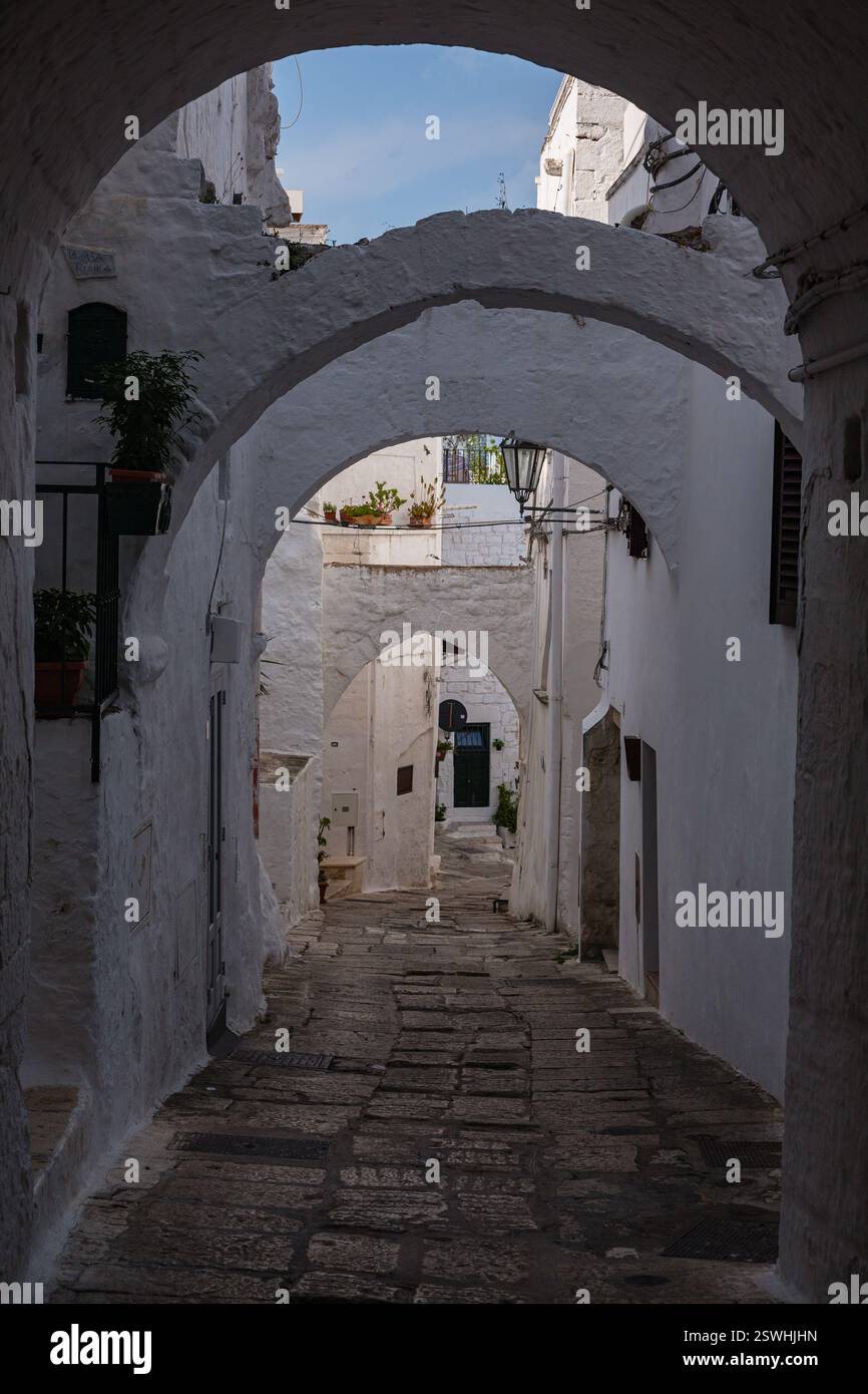 The back alley of Ostuni, Italy Stock Photo - Alamy