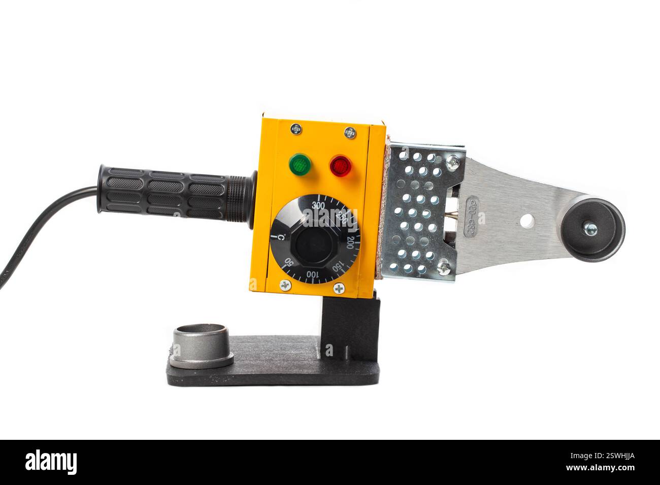 Electric soldering iron for welding polypropylene pipes on a white ...