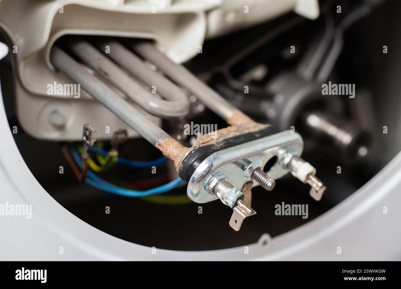 Removed electric heating element of a washing machine with scale and ...