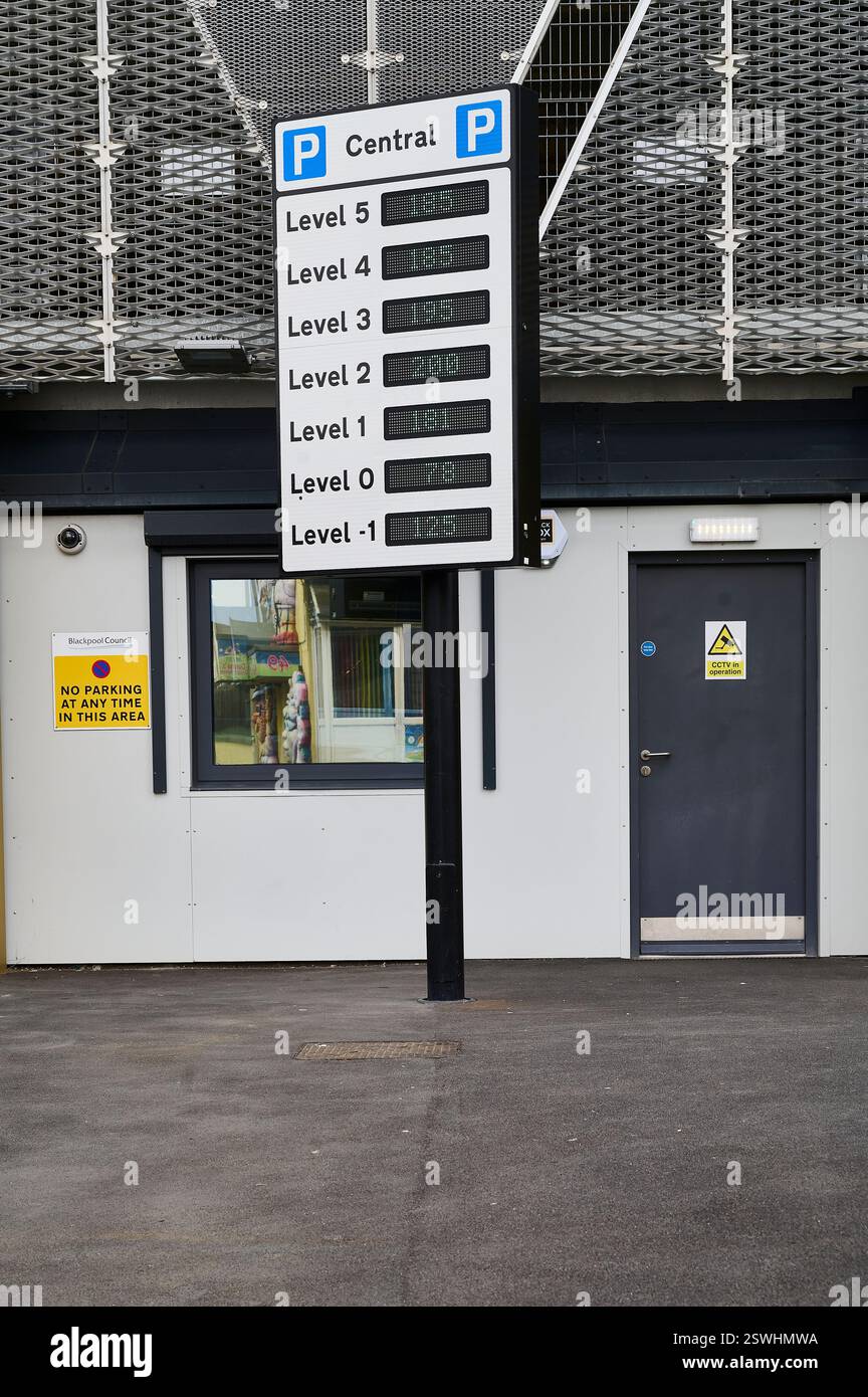 Car spaces available in multi storey car park Stock Photo - Alamy