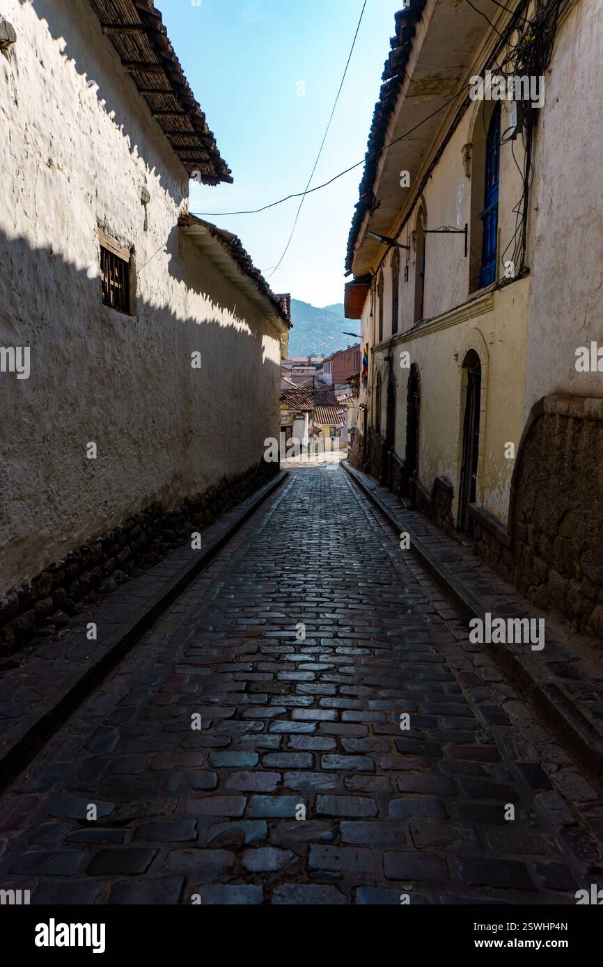 Historic street in Cusco Peru filled with traditional buildings ...