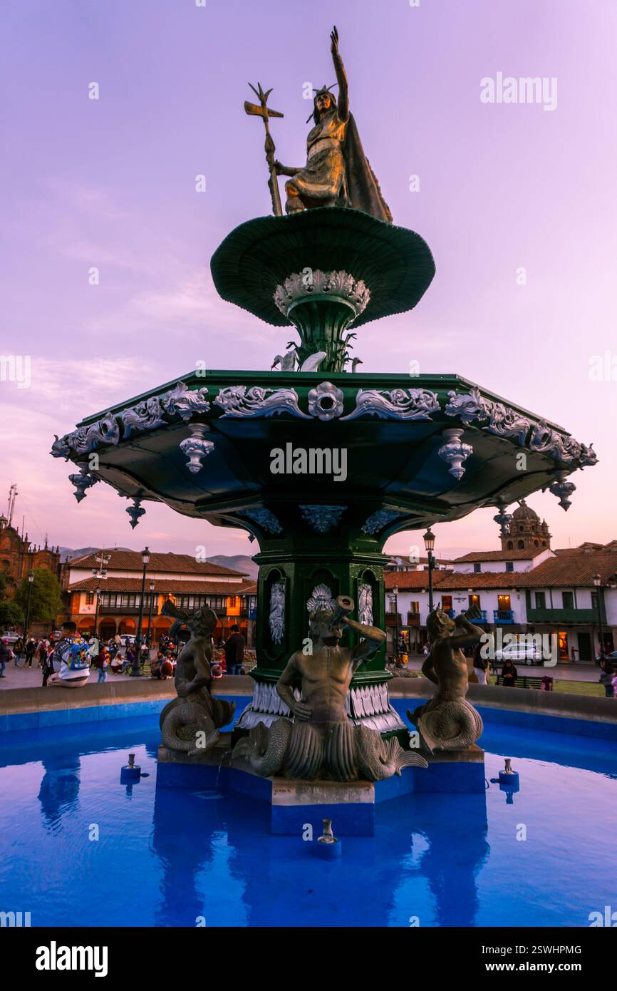 This photograph captures the Inca statue and fountain in the Plaza de ...