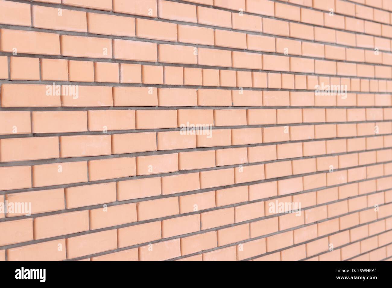 Brick wall side view background. Orange brick wall background for ...