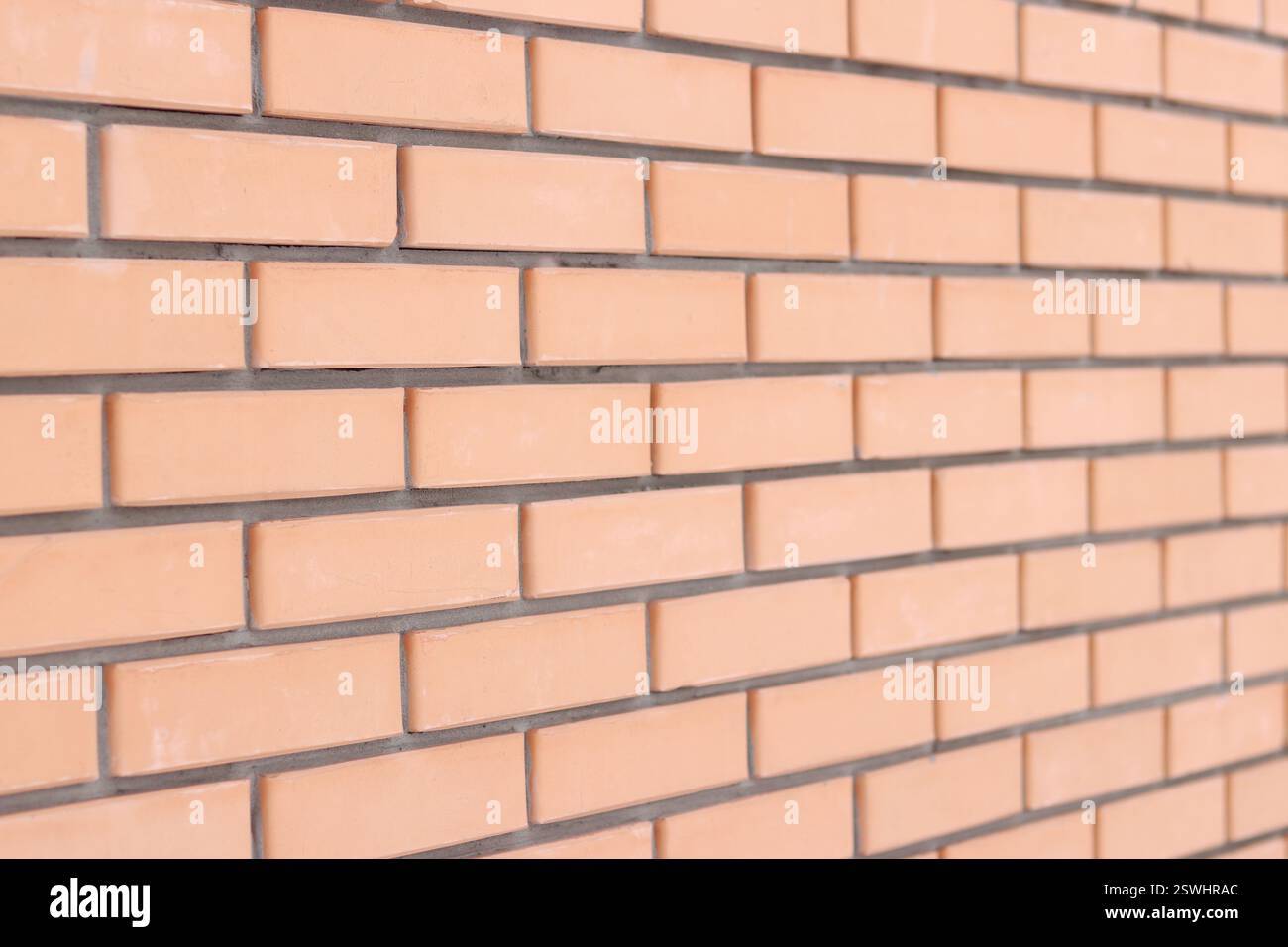 Brick wall side view background. Orange brick wall background for ...