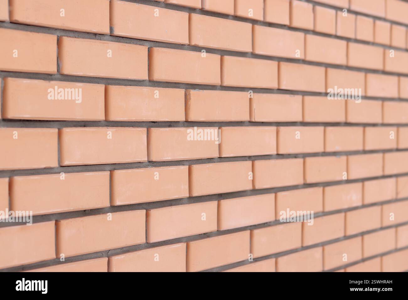 Brick wall side view background. Orange brick wall background for ...