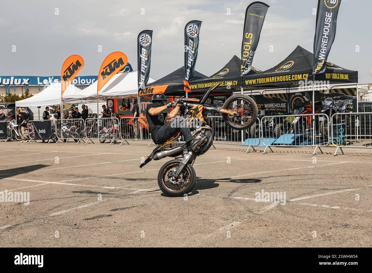 Motorcycle festival in Nicosia. Men performing tricks on motocross ...