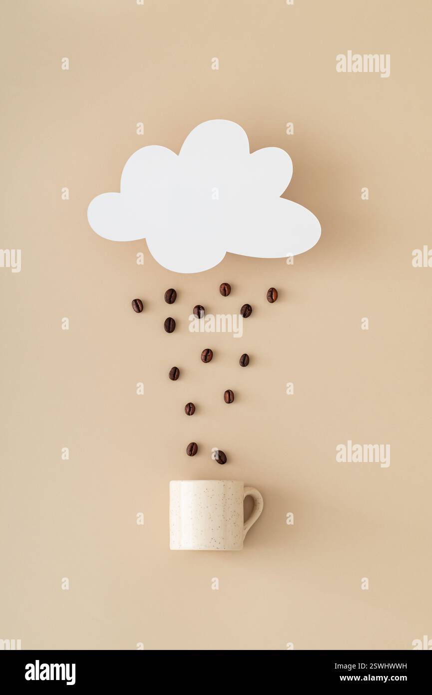 Creative layout made of cloud shape paper card note, coffee beans rain ...