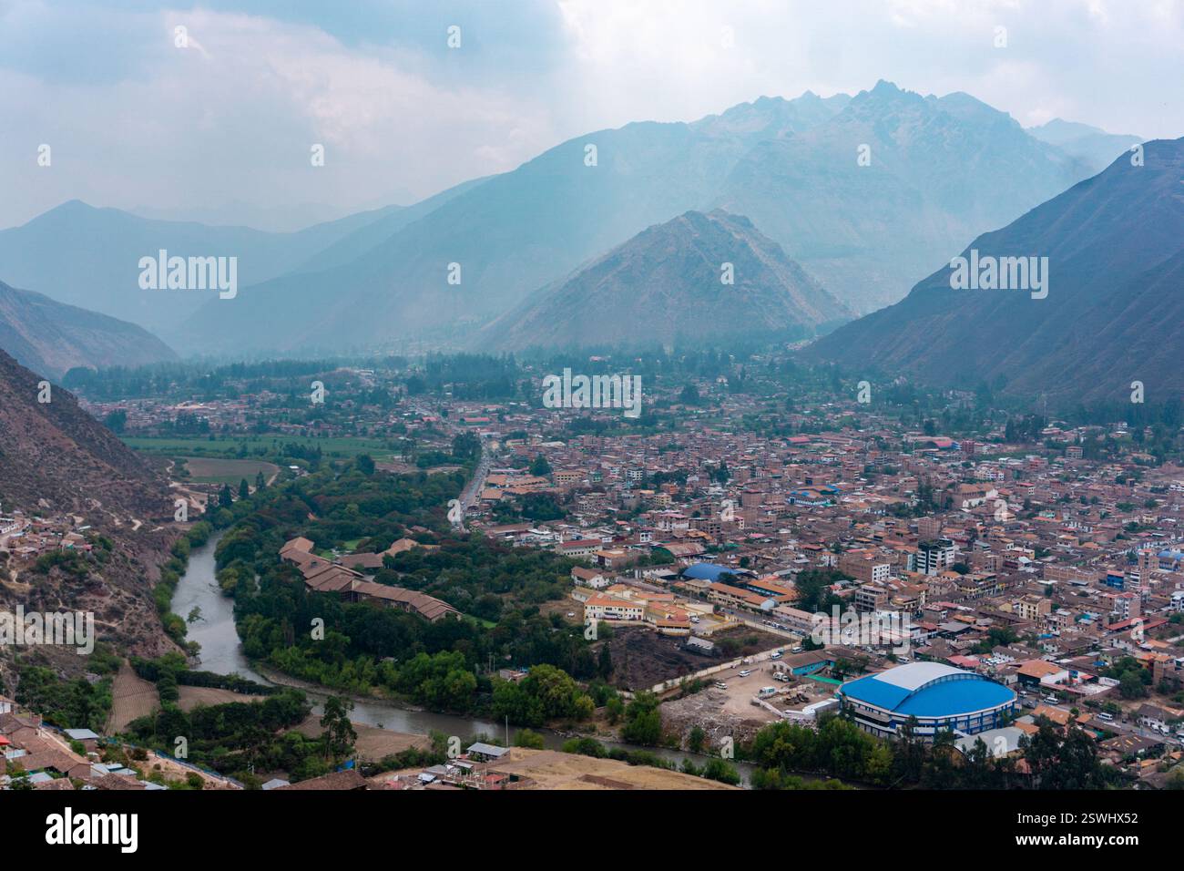 A serene landscape of Urubamba, Peru, showing the charming city nestled ...