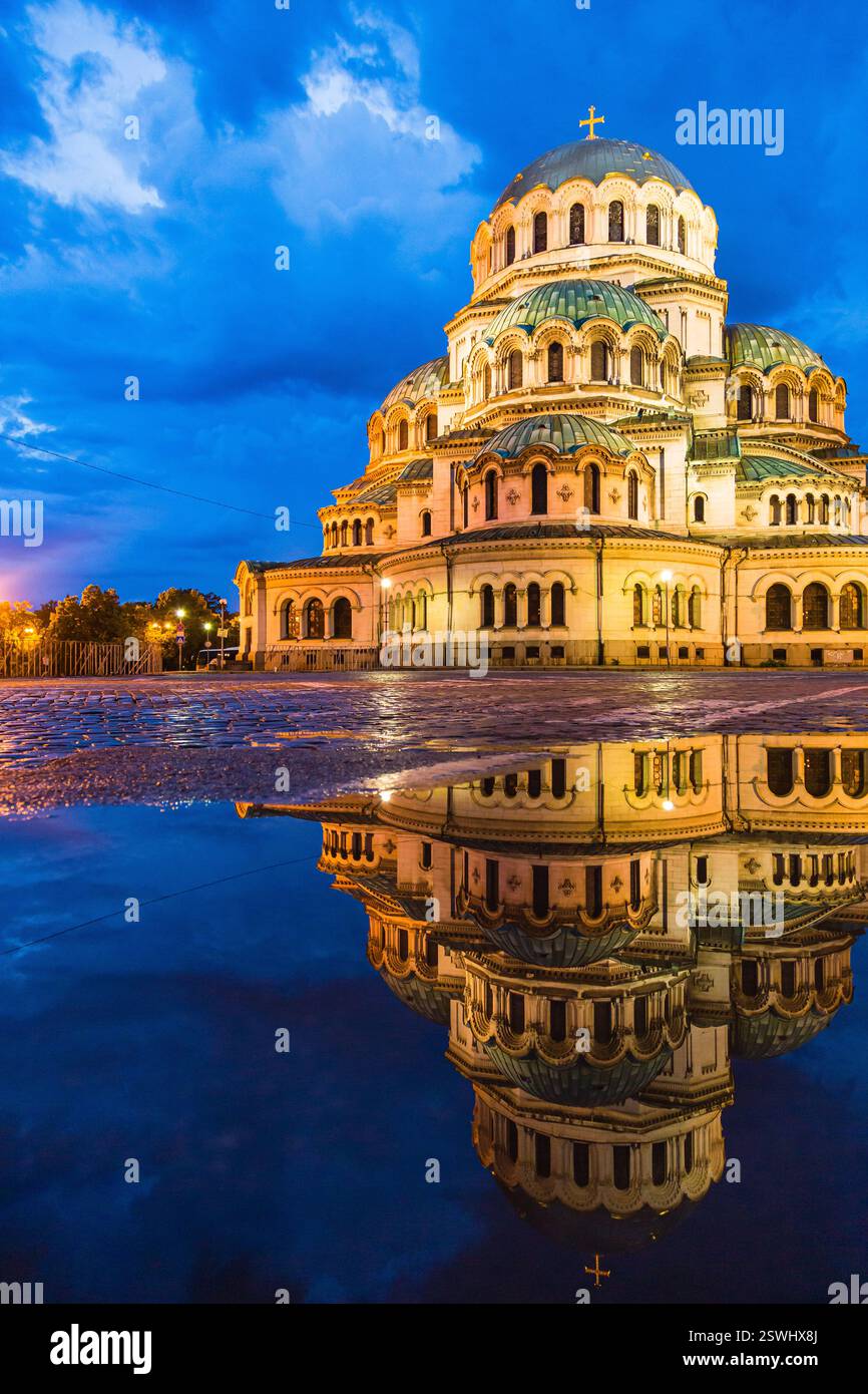 The Alexander Nevsky Cathedral illuminated in a puddle in Sofia ...
