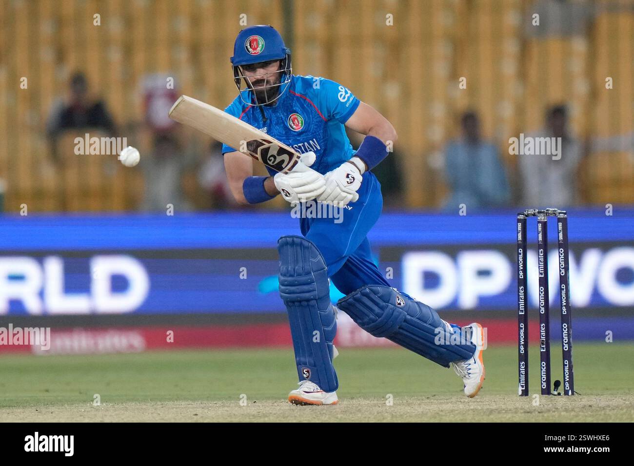 Afghanistan's Ibrahim Zadran plays a shot during the ICC Champions ...
