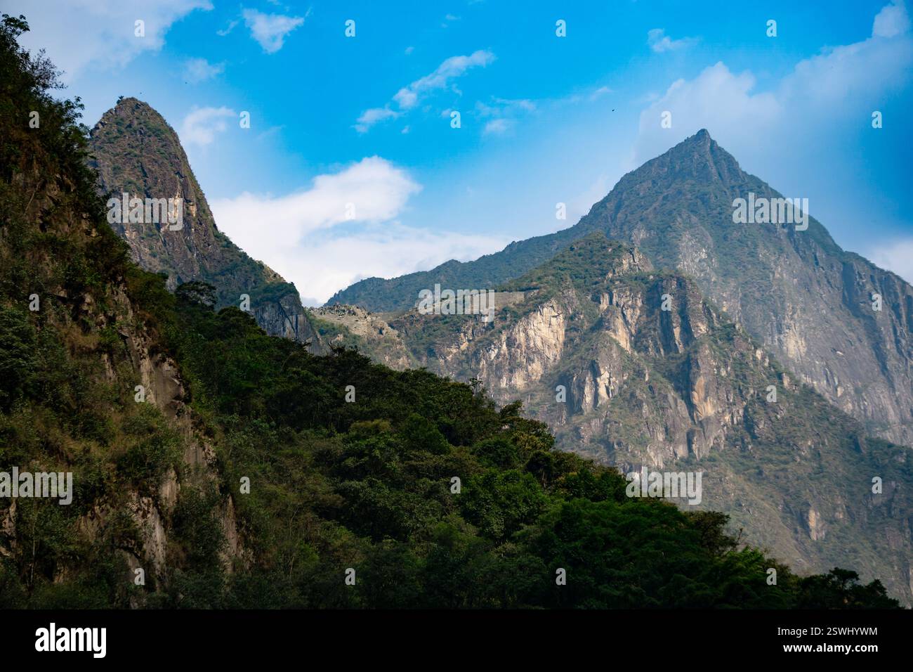 Scenic panorama of Machu Picchu and the surrounding mountains in the ...