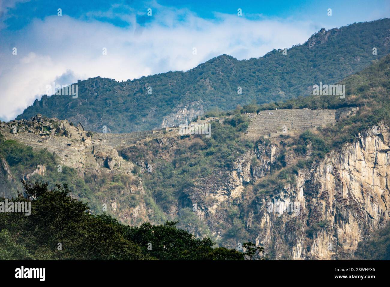 Stunning view of Machu Picchu surrounded by majestic mountains in the ...