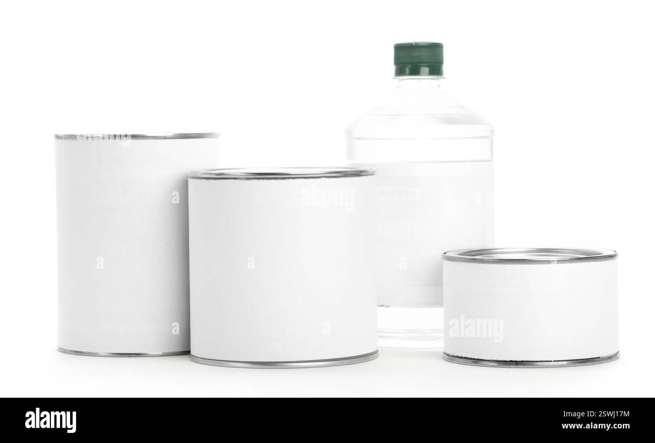 White tin cans with paint isolated on white background, copy space ...