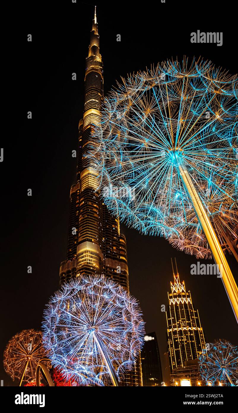 Burj Khalifa with colorful LED show, Dubai, UAE. Dubai downtown and ...