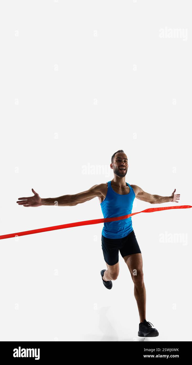 Professional runner, man crossing red finishing line, winning marathon ...