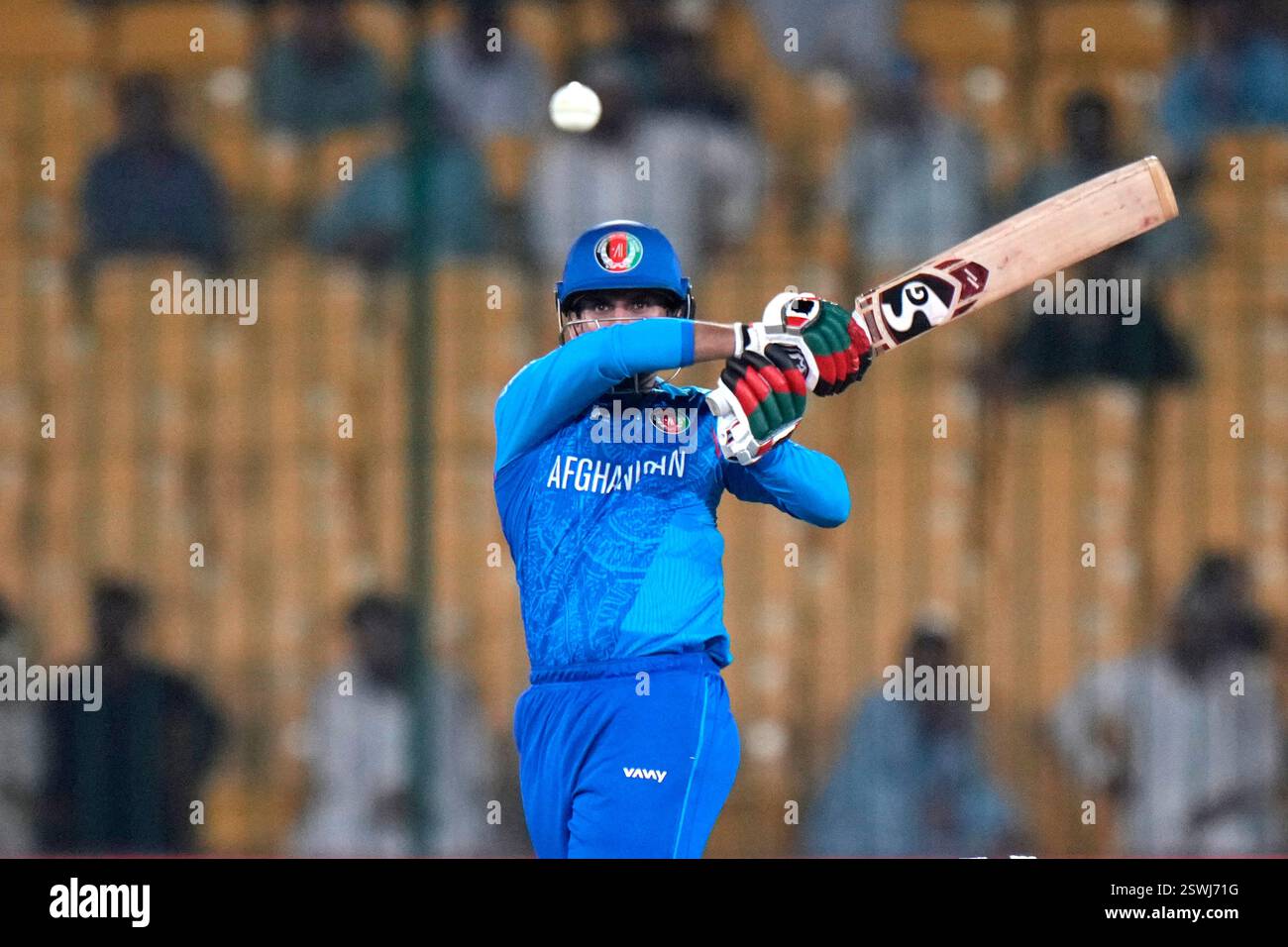 Afghanistan's Azmatullah Omarzai plays a shot during the ICC Champions ...