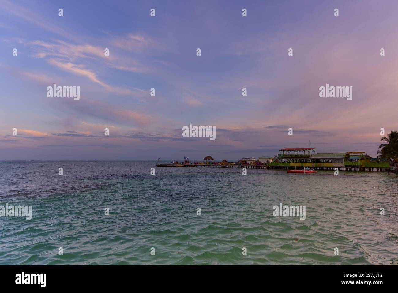 Sunset view from Caye Caulker Split before the storm, Belize Stock ...