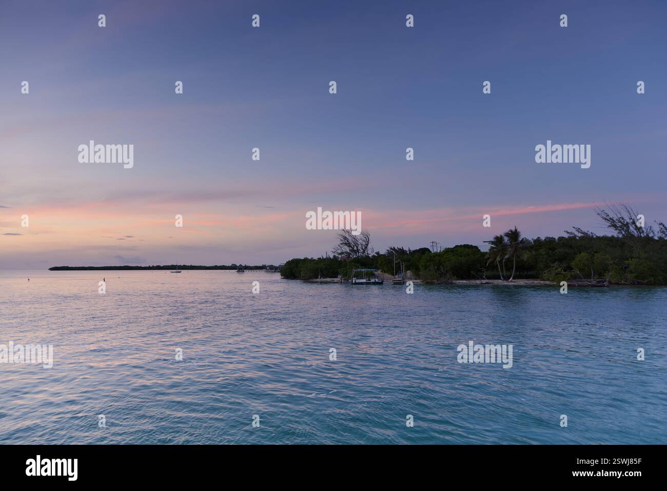 Sunset view from Caye Caulker Split before the storm, Belize Stock ...