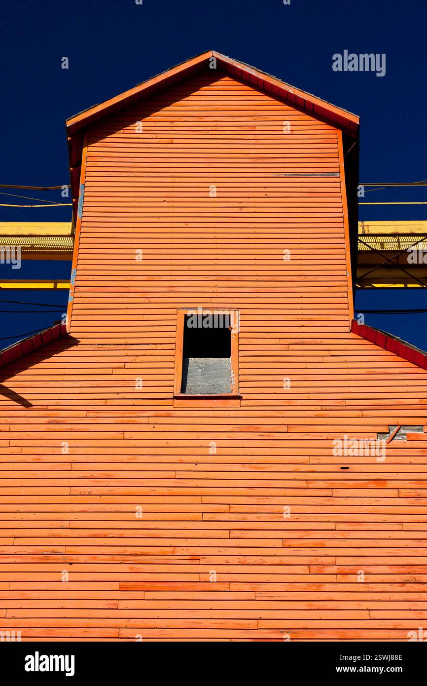 The building is a large, old-fashioned structure with a slanted roof ...