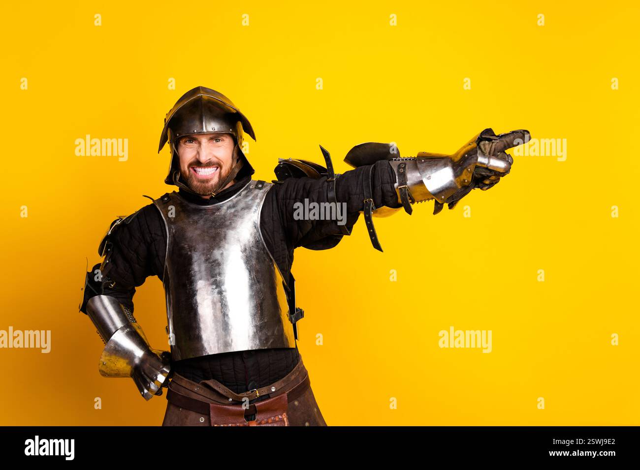 Medieval knight in full armor with a vibrant yellow background and an ...
