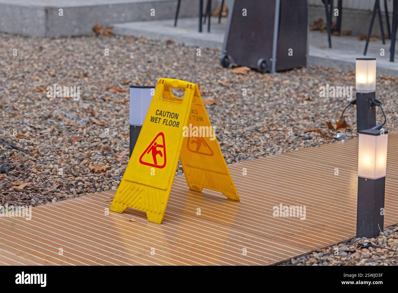 Yellow Plastic Warning Sign Caution Wet Floor at Slippery Walk Path ...