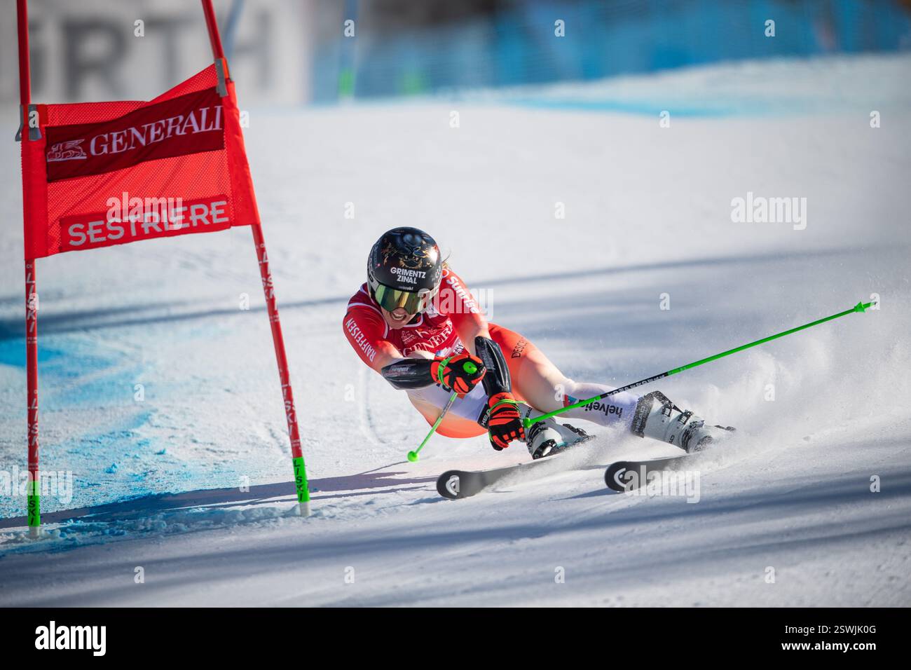 Suisse’s Camille Rast speeds down the course during an alpine ski ...