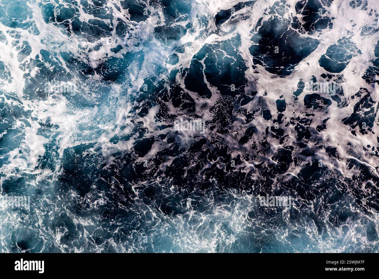 Ocean water surface texture. Aerial view of elegant water with foam ...