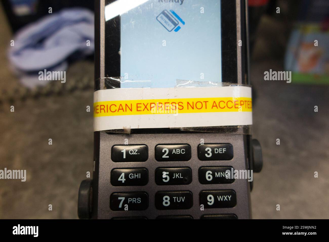 Debit / credit card reader & pin code buttons, terminal at shop counter ...