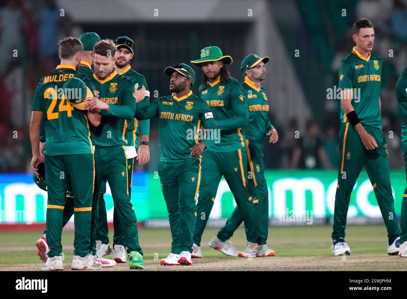 South Africa's Temba Bavuma, center, and teammates congratulate each ...