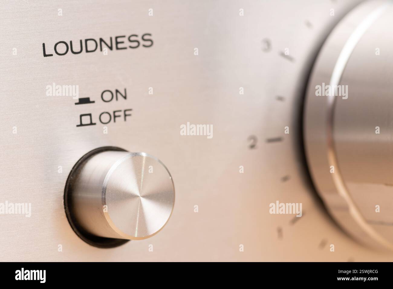 Detailed image of a close-up view of a stereo control panel featuring a ...