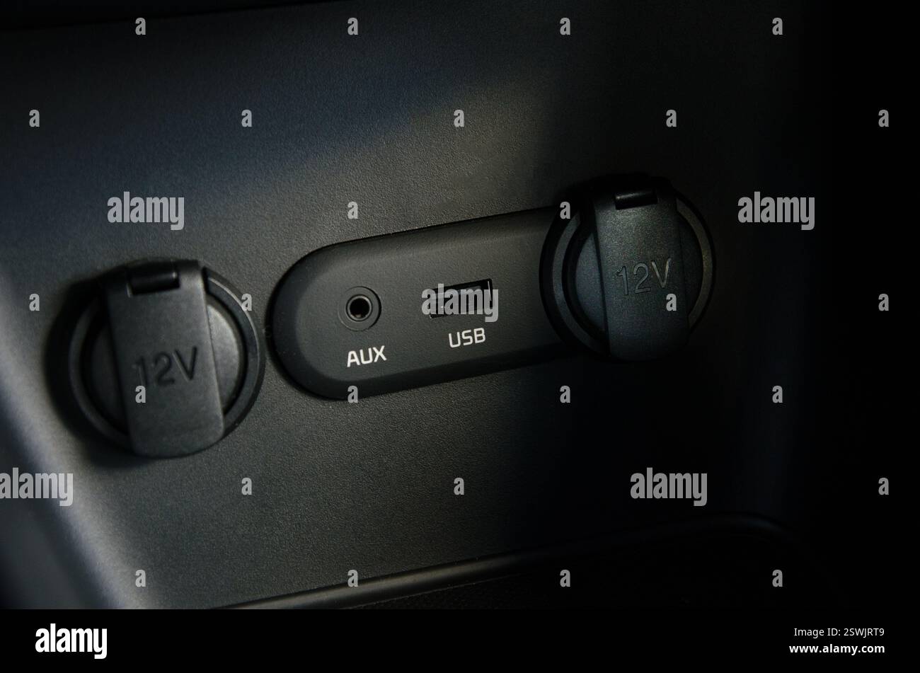 Car interior detail: AUX USB and 12V power ports Stock Photo - Alamy