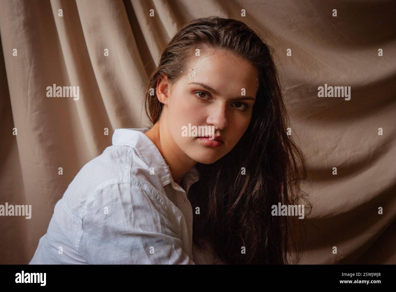Individual in light shirt hi-res stock photography and images - Alamy