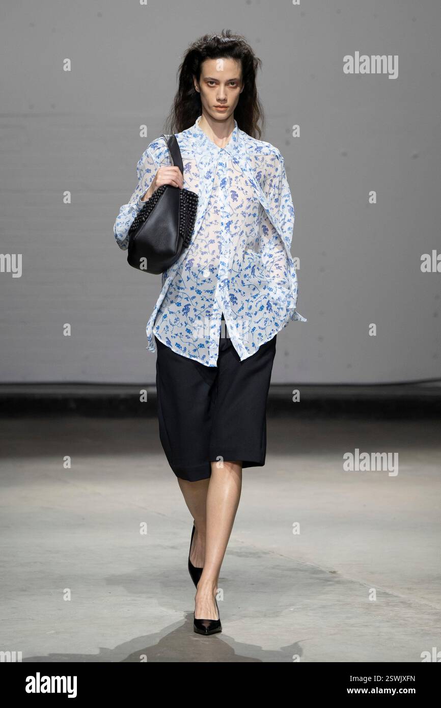 A model walks on the runway during the SS Daley Ready to Wear Fashion ...